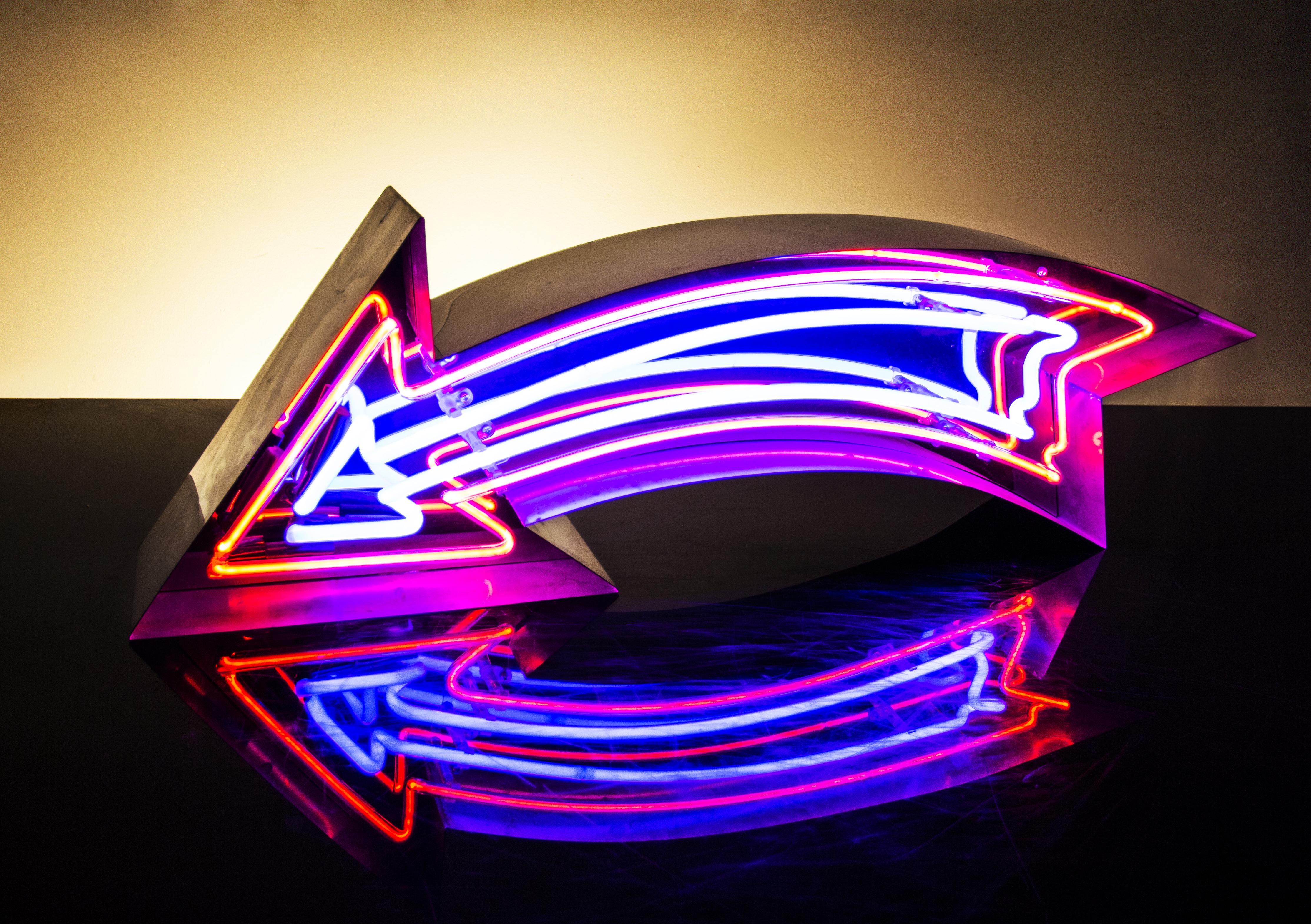 Neon Arrow on Steel - Kemp London - Bespoke neon signs and prop hire.