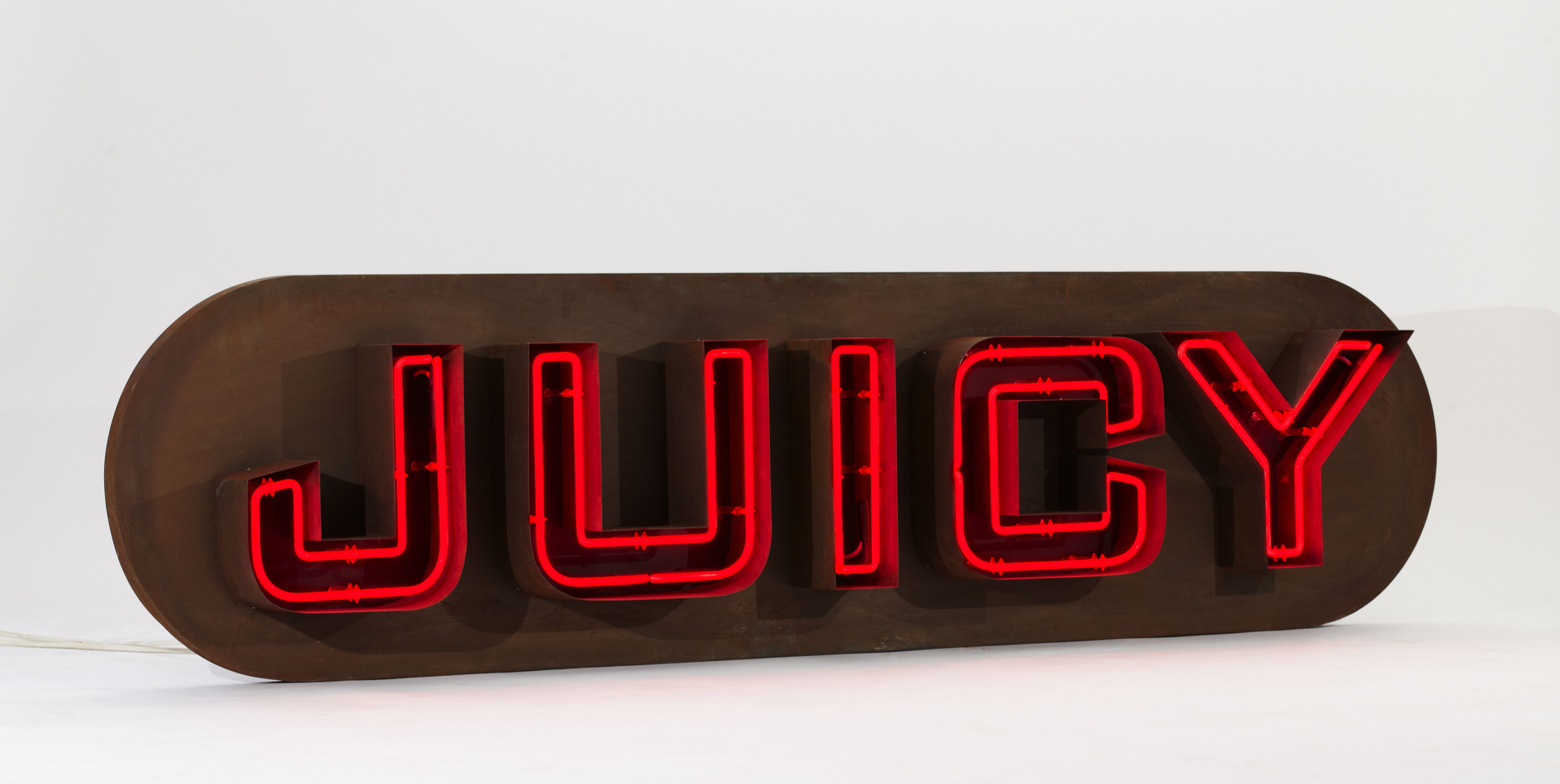 Neon Juicy Sign Hire - Kemp London - Bespoke neon signs and prop hire.