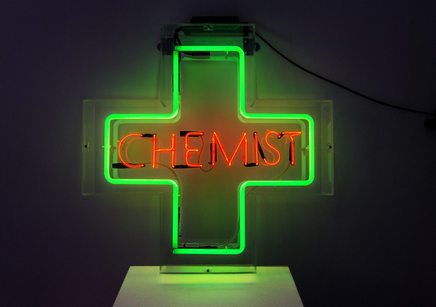Neon Chemist Hire - Kemp London - Bespoke neon signs and prop hire.